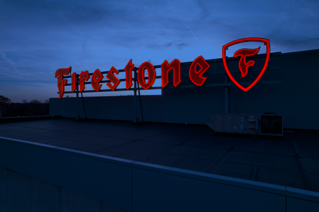 Bridgestone adds test track in Akron, lights Firestone sign | Rubber News
